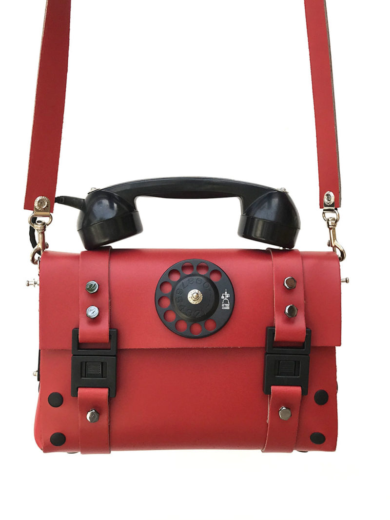 red leather shoulder bag with vintage telephone handset handle ...